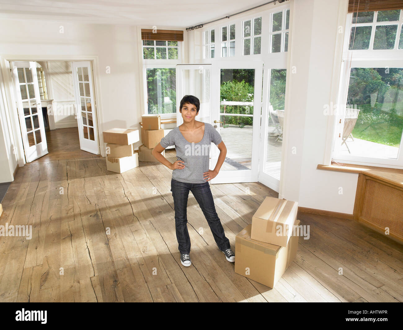 Women moving into new house Stock Photo - Alamy