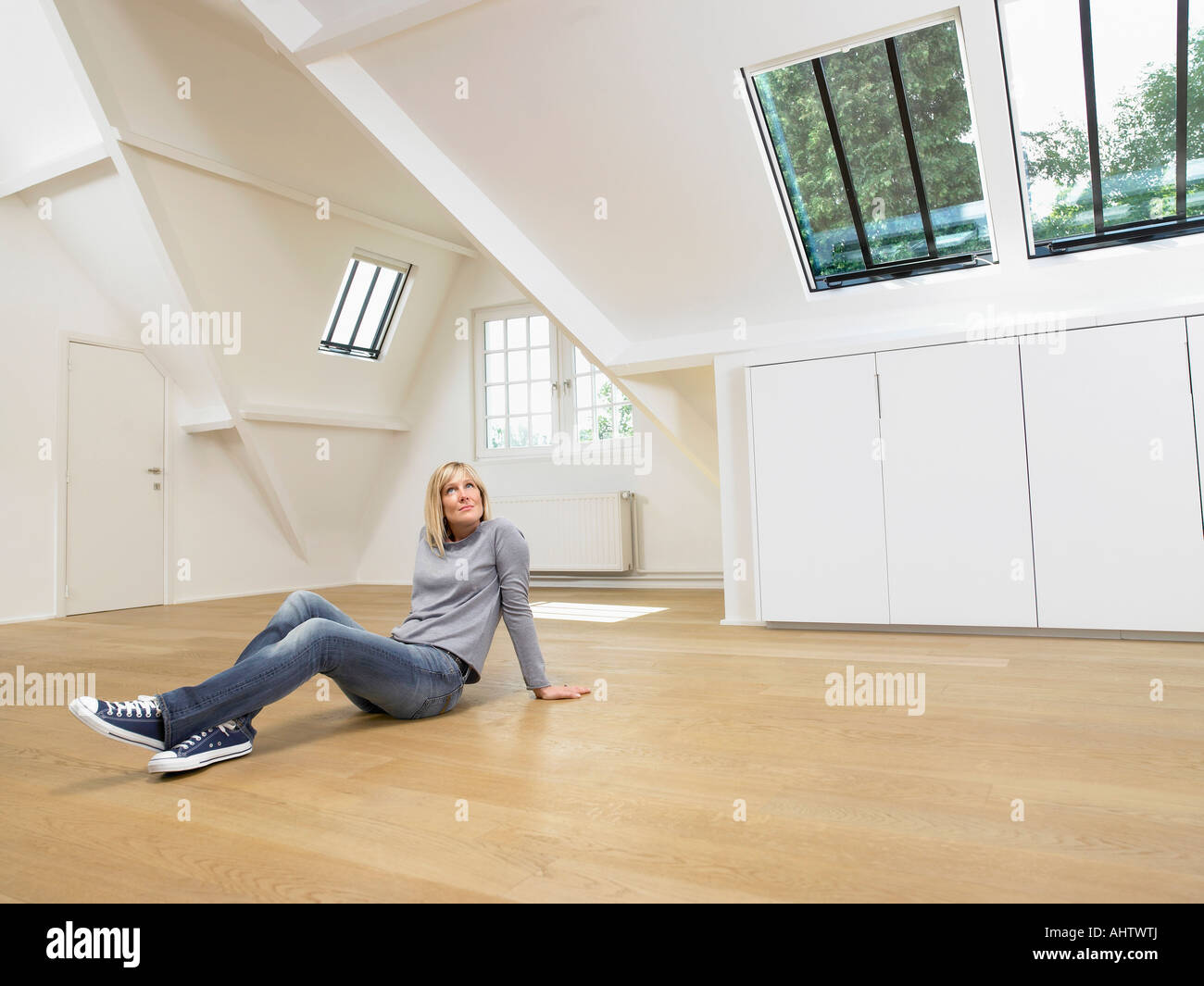 Woman wooden floor hi-res stock photography and images - Alamy