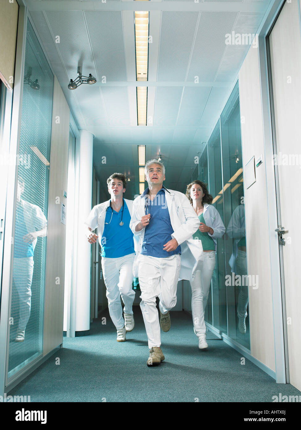 Doctor running in corridor hi-res stock photography and images - Alamy