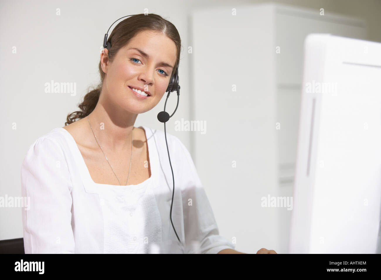 Female executive facing computer hi-res stock photography and images ...