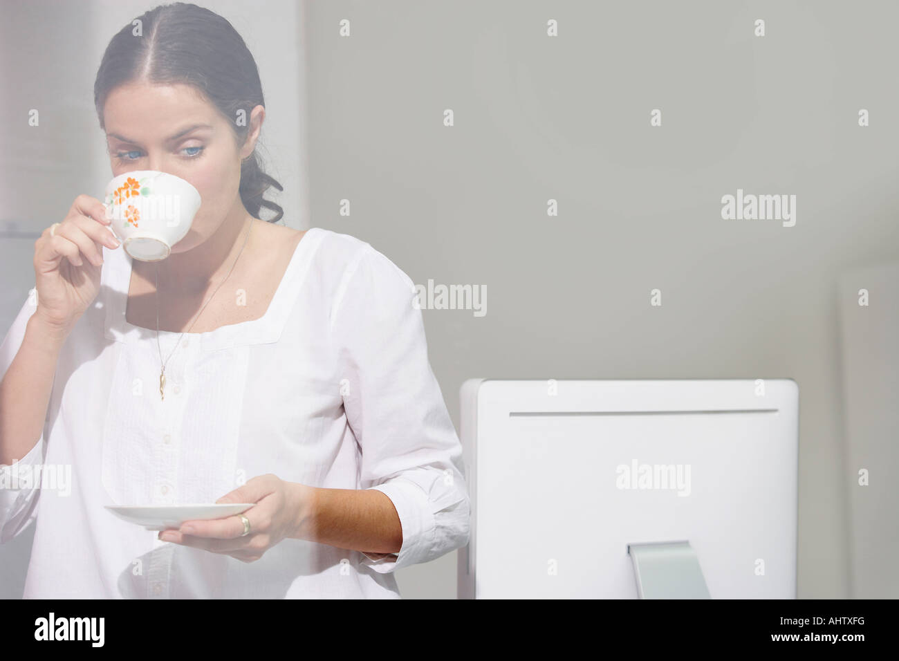 British business holding drinking tea hi-res stock photography and ...