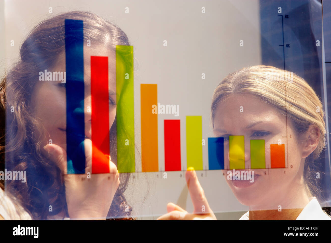 Two young women seen through graph Stock Photo - Alamy