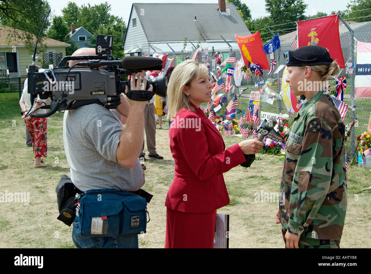 Television Newspaper Magazine Radio reporter conducts interview about ...