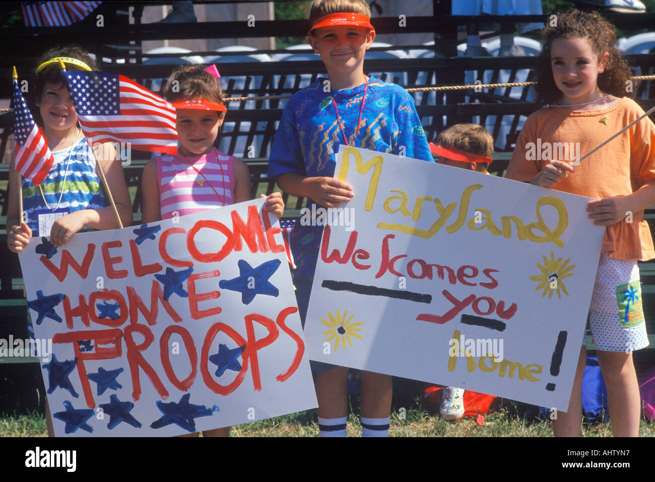 Children Holding Welcome Home Signs Desert Storm Victory Parade ...