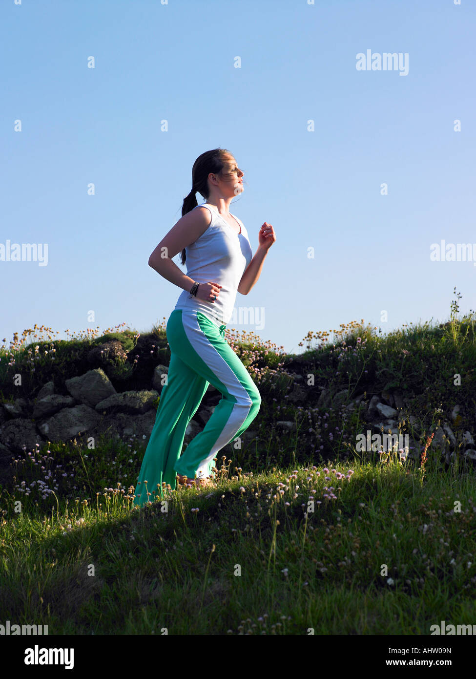 Running up the hill hi-res stock photography and images - Alamy