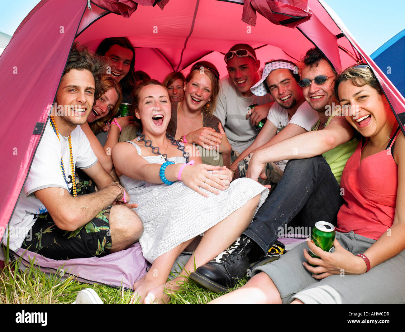 Group of people in tent Stock Photo - Alamy