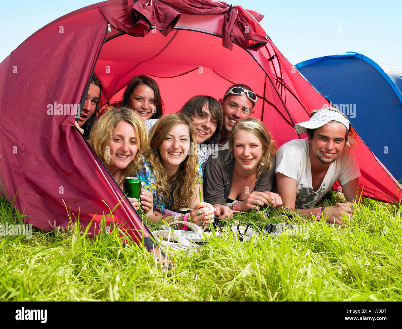Group of people lying in tent Stock Photo - Alamy