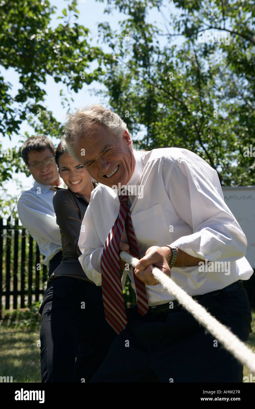 Tug of war team two pulling hi-res stock photography and images - Alamy