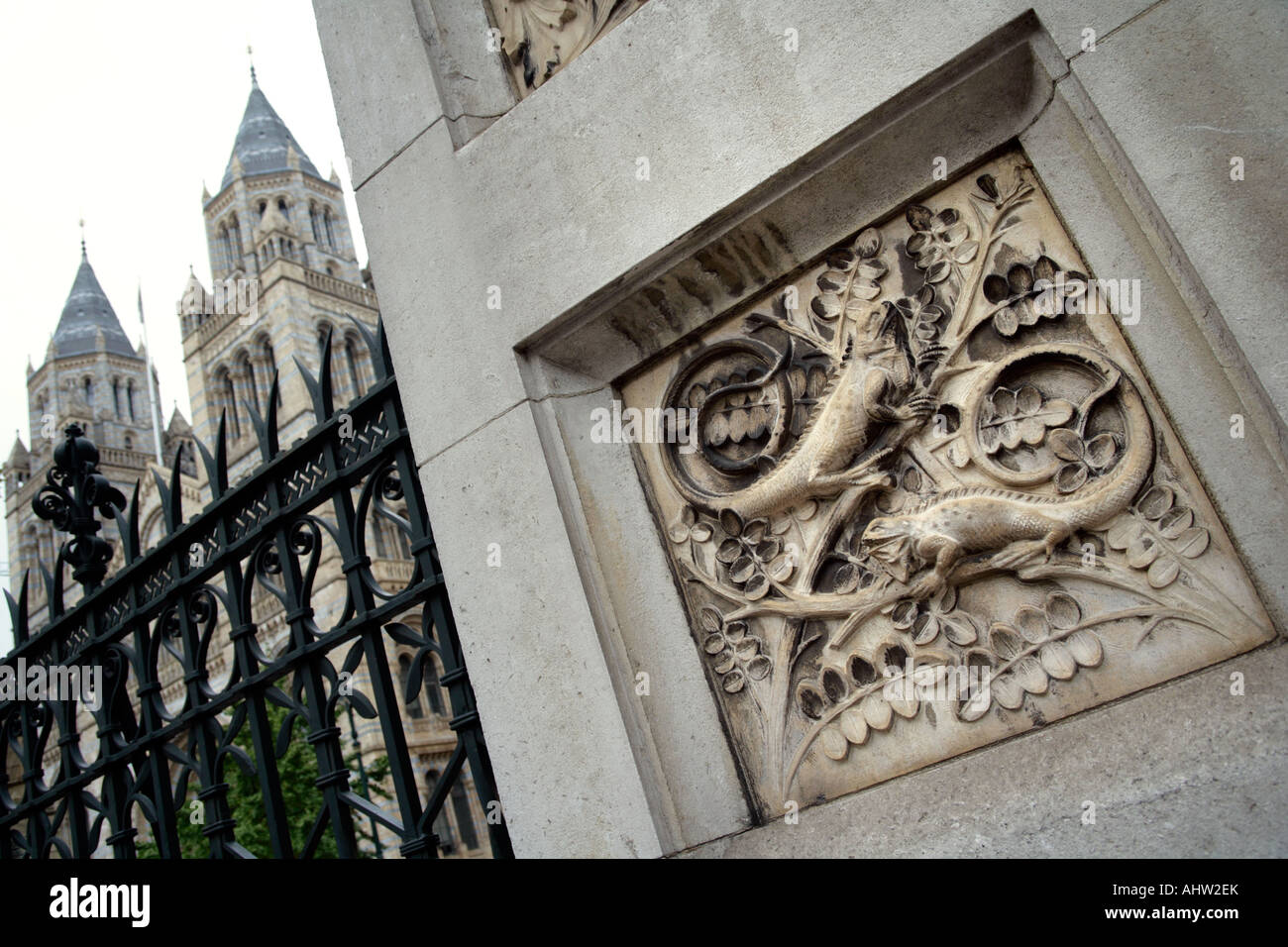Ornemental artwork depicting a pair of chameleons by the entrance gates ...