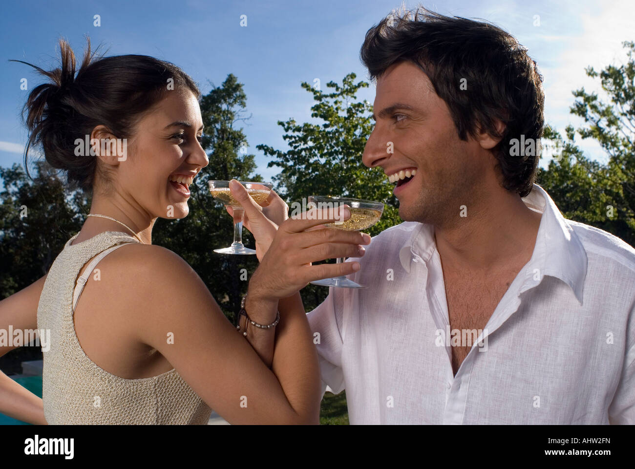 Couple drinking champagne Stock Photo - Alamy