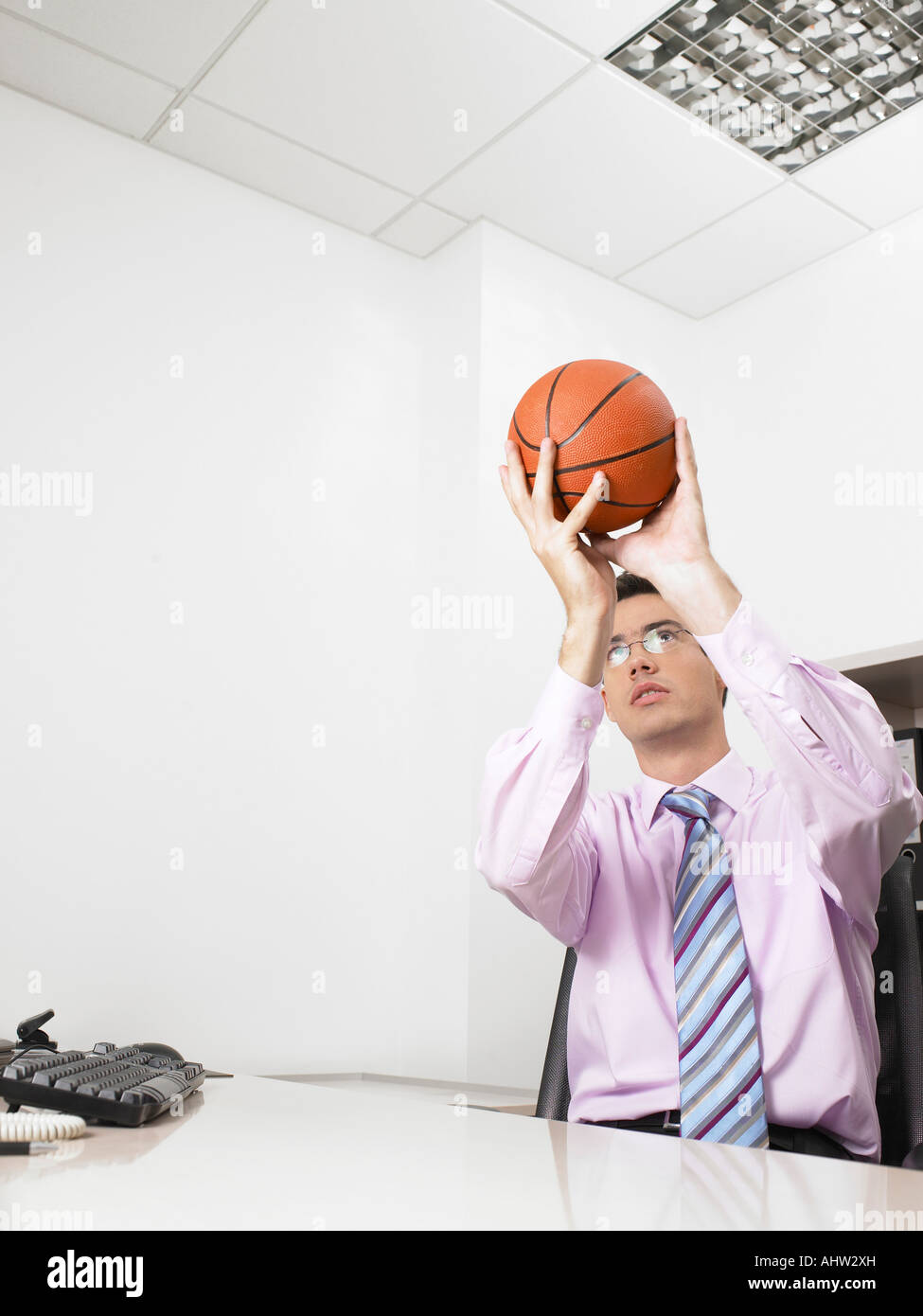 Shooting basketball at desk hi-res stock photography and images - Alamy