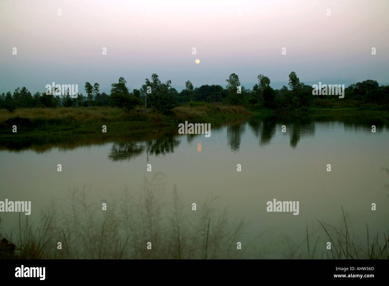 Moonrise over water hi-res stock photography and images - Alamy