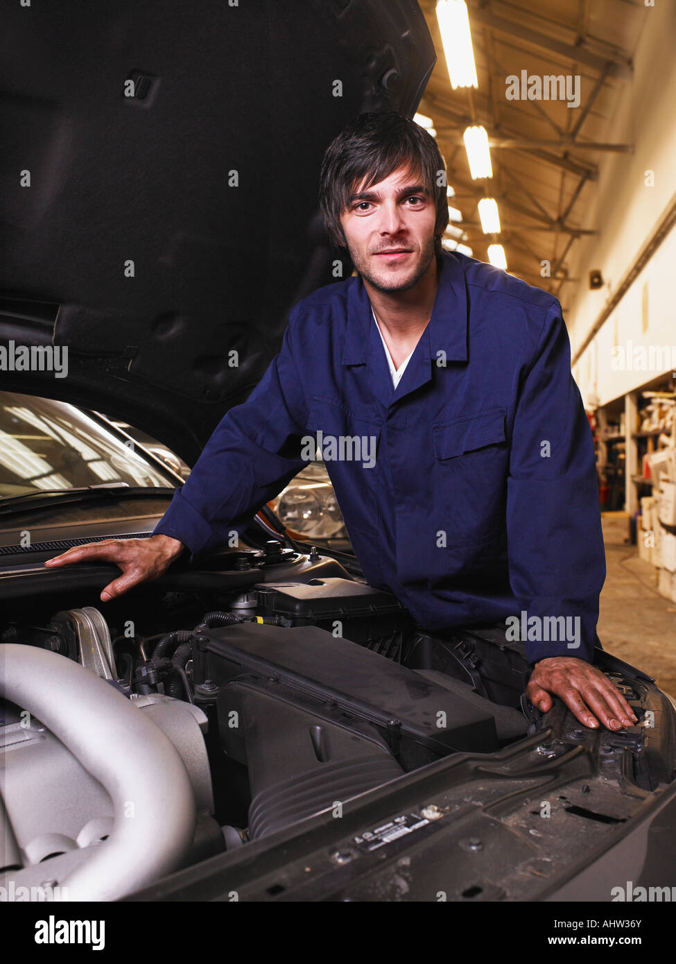 Mechanic working on an engine Stock Photo - Alamy