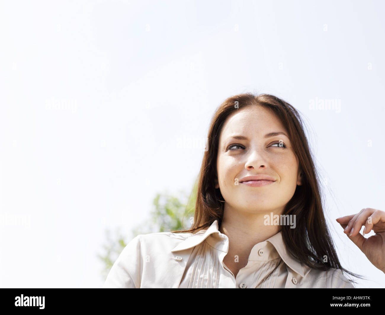 Woman standing outdoors Stock Photo - Alamy