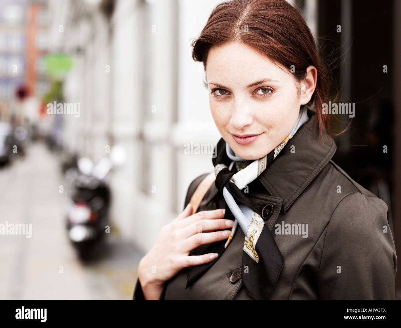 Woman standing outdoors Stock Photo - Alamy
