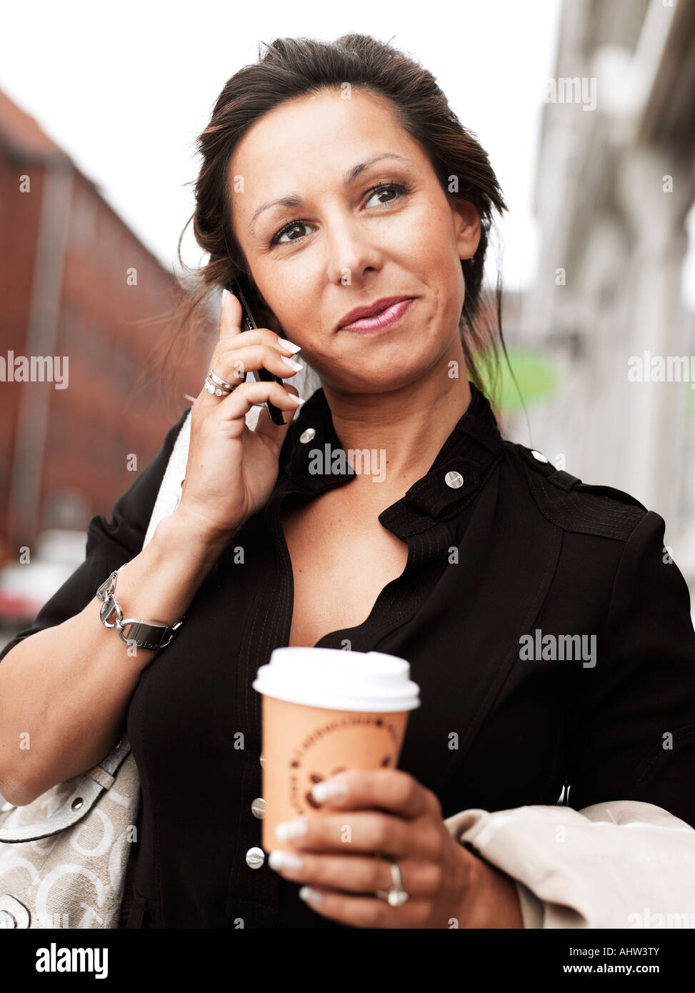 Woman standing outdoors Stock Photo - Alamy