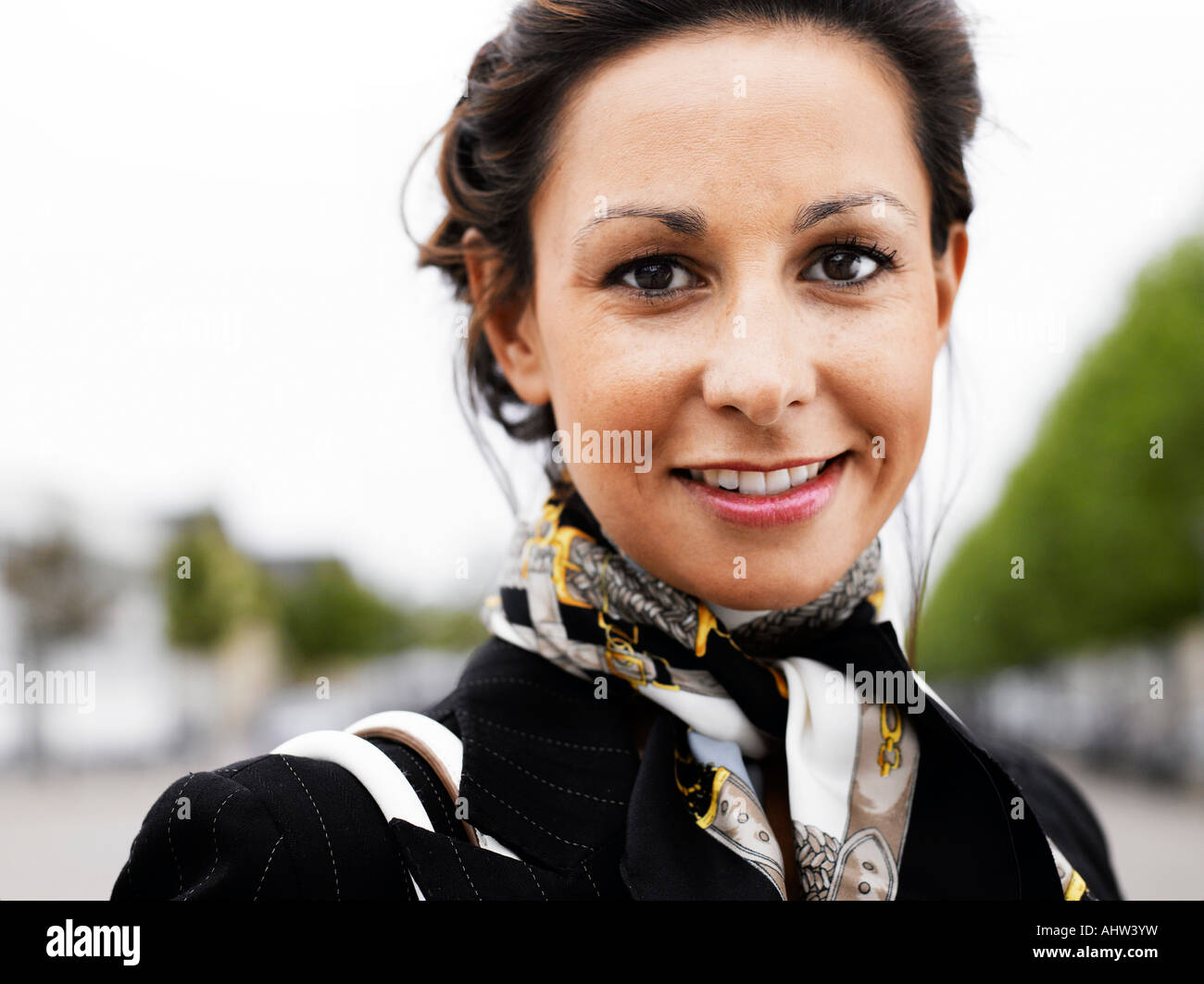 Woman standing outdoors Stock Photo - Alamy