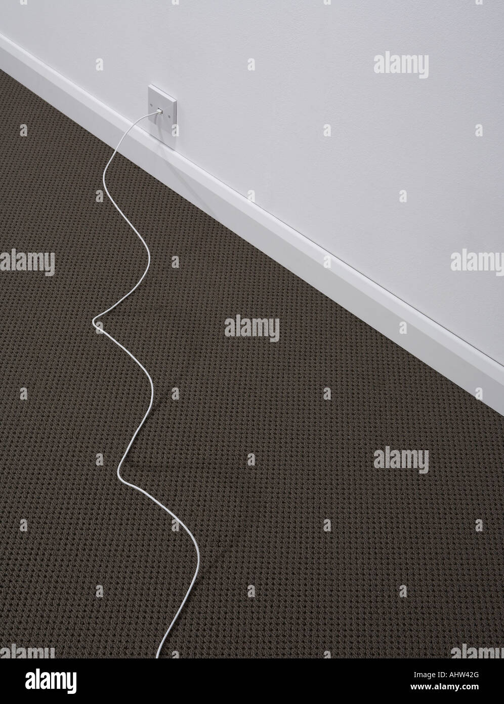 A phone cord and plug Stock Photo - Alamy