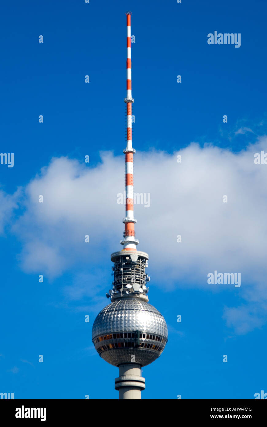 Vertical view of the TV tower 'Fernsehturm' situated in Alexanderplatz on a bright sunny day ...