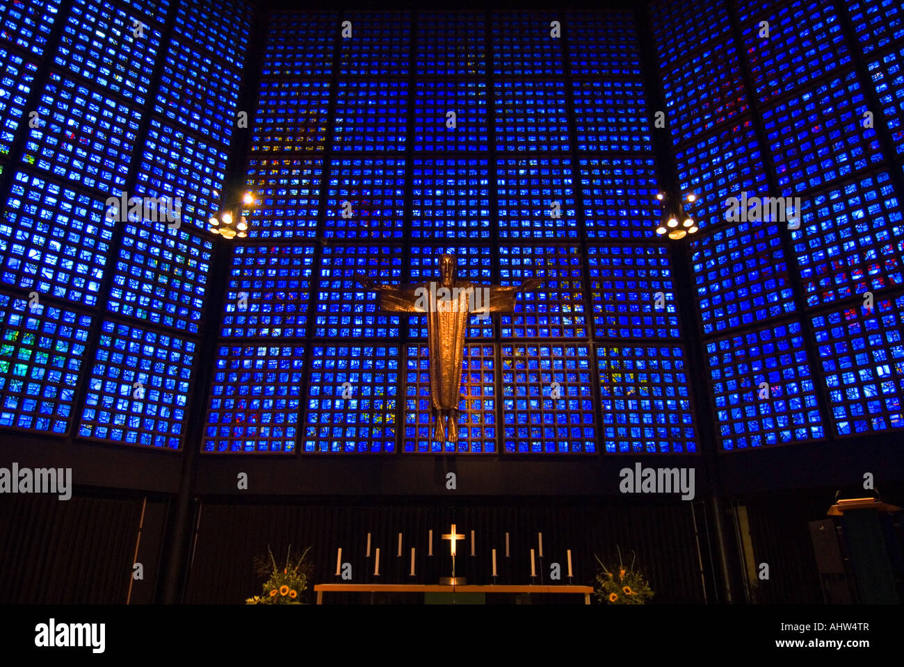 Horizontal wide angle of the altar and blue stained glass windows ...