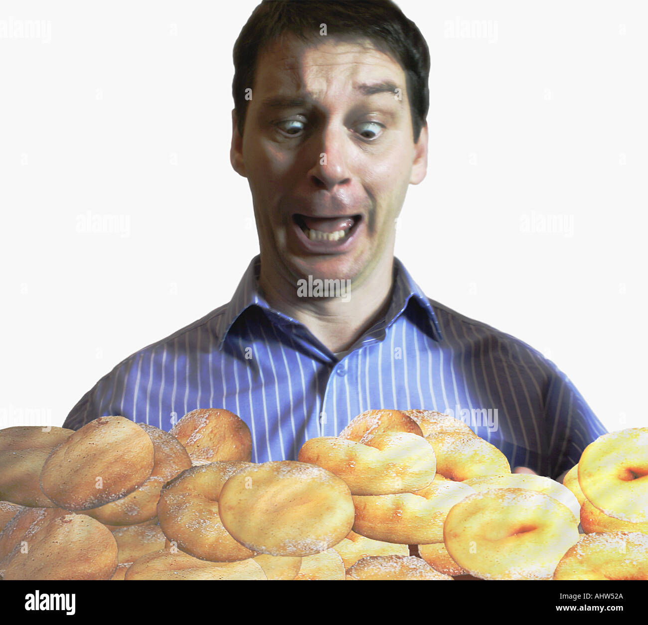 Composite showing man in fear of donuts Stock Photo - Alamy