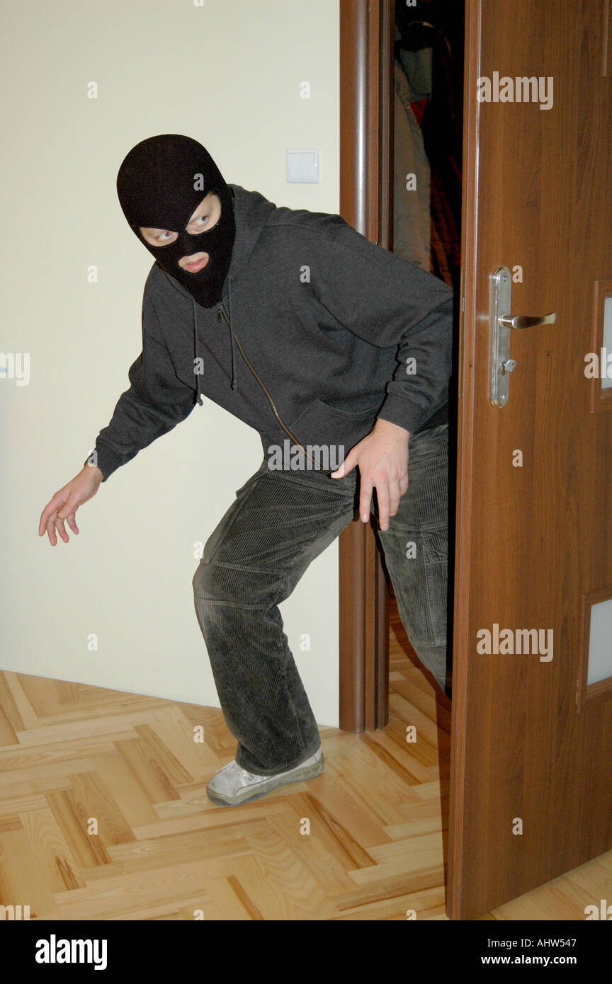 Burglar in action Stock Photo - Alamy