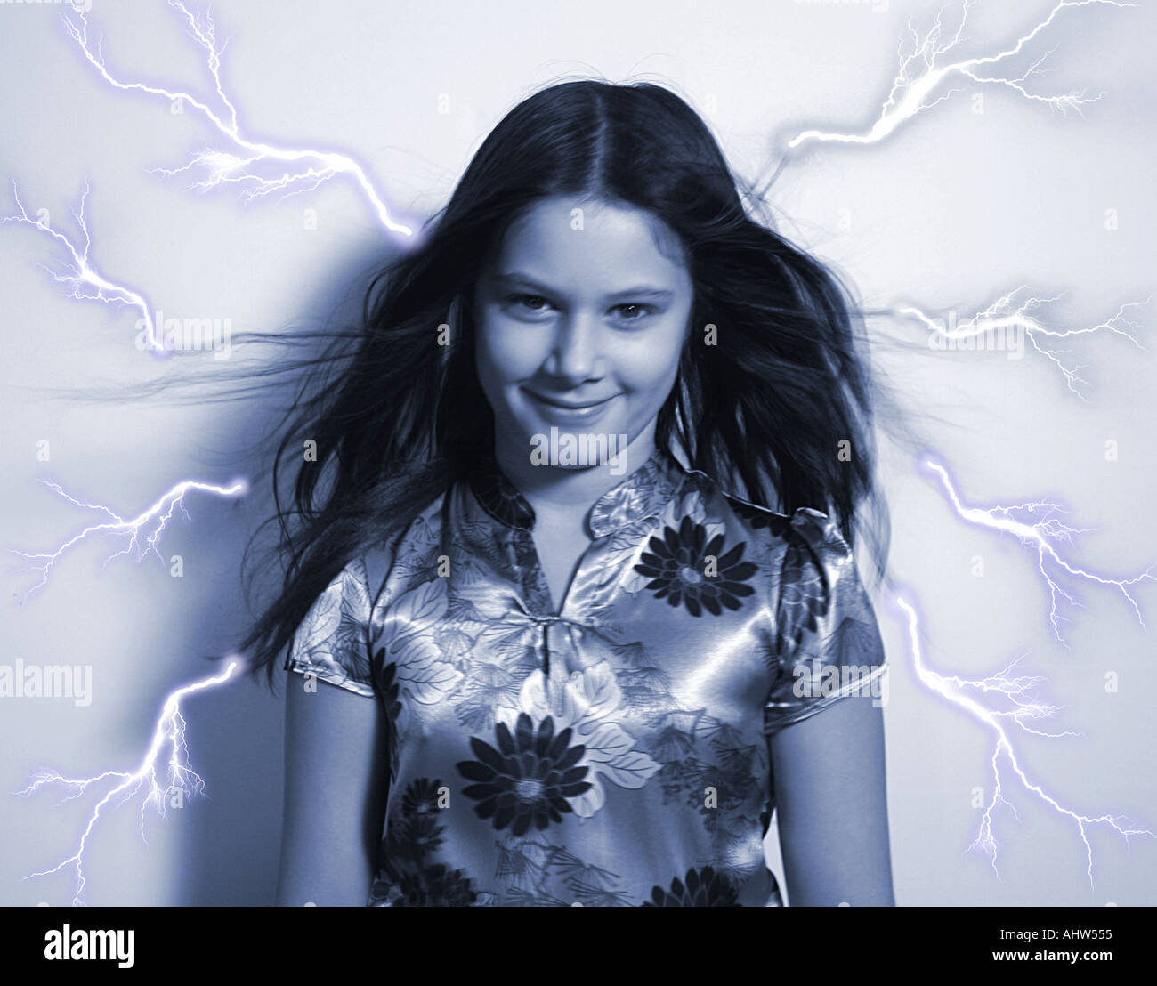 Special effect with young girl with hair touched by forks of lightning ...