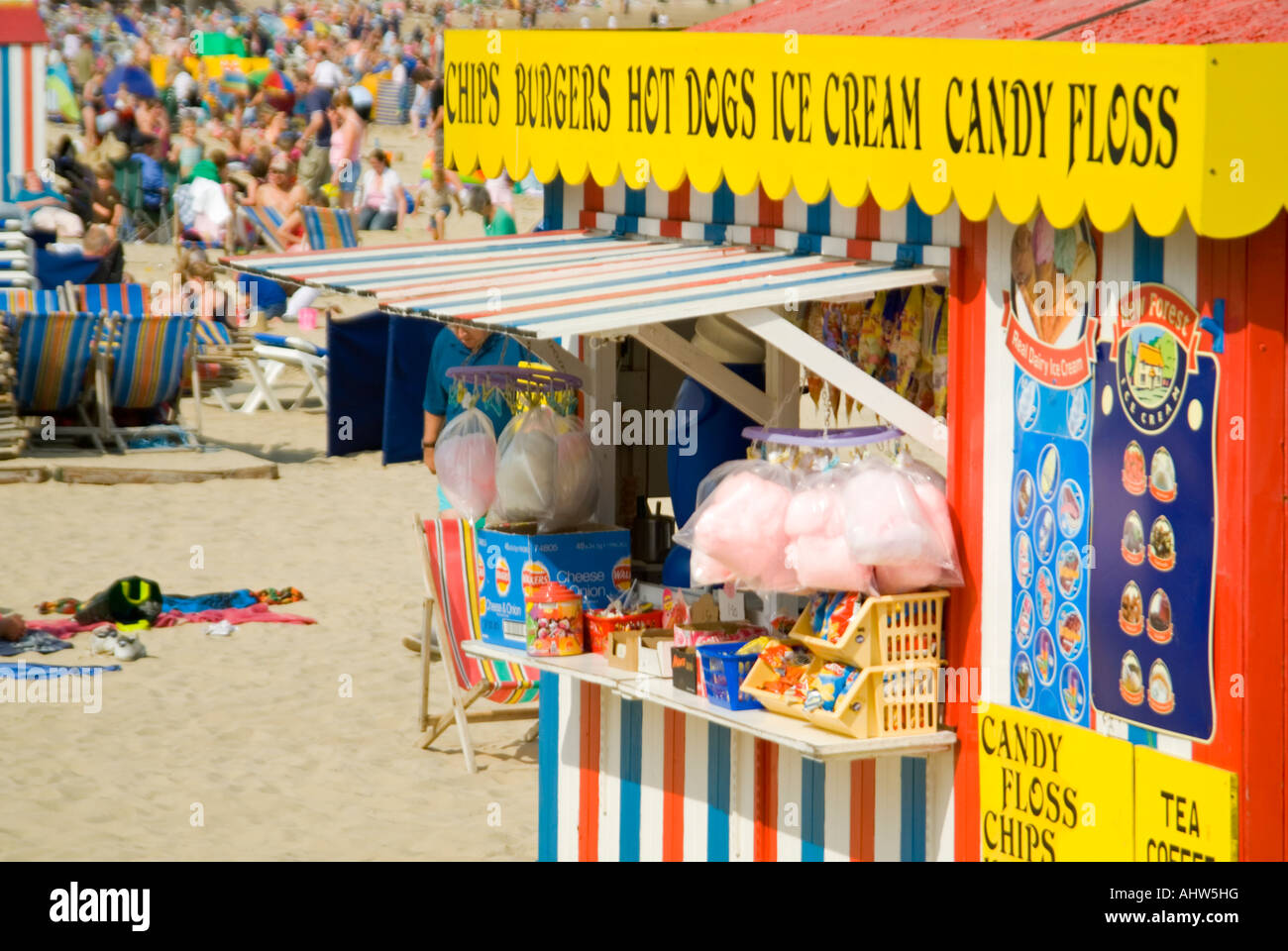 Horizontal view of a bright traditional fish and chip fastfood stand on ...