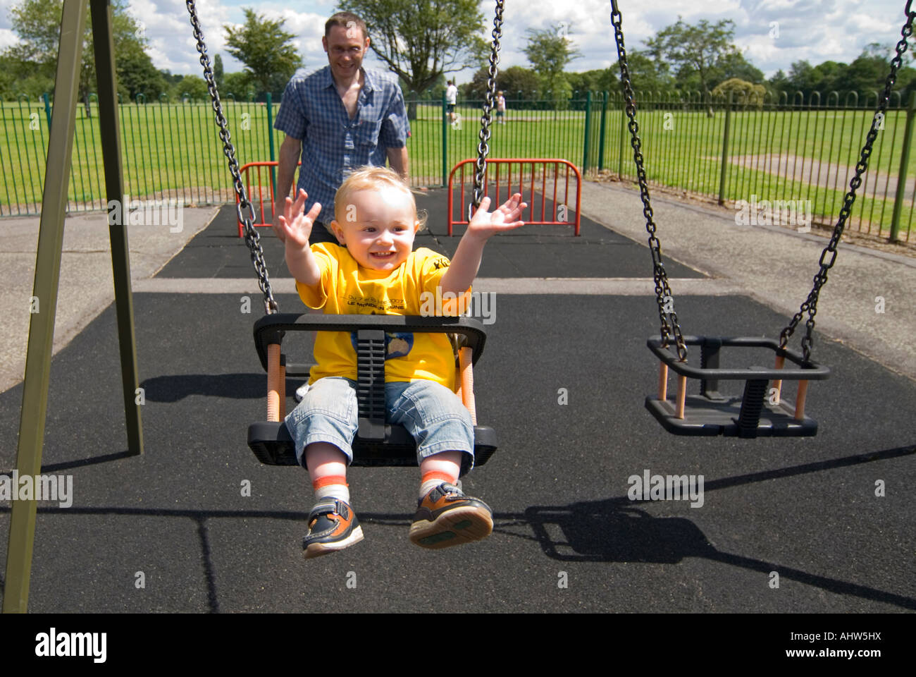 Horizontal close up of a 16 month old baby boy clapping with excitement ...