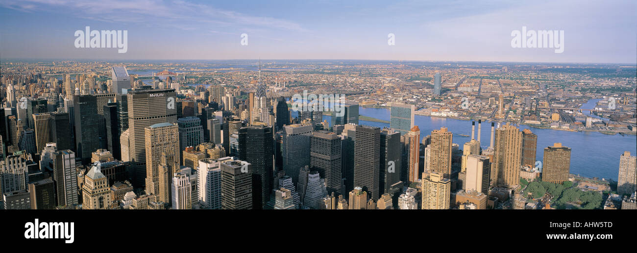 This is an aerial view of Manhattan with a view of the Empire State ...