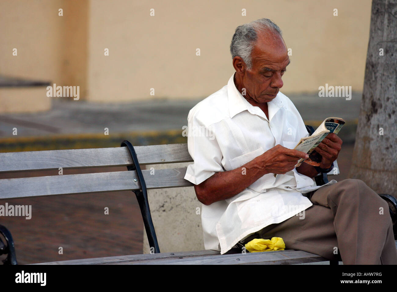Man Reading A Magazine