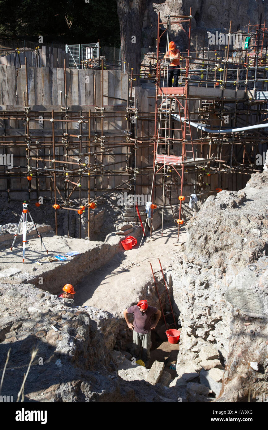Excavations and archeological workers work on a section of the imperial ...