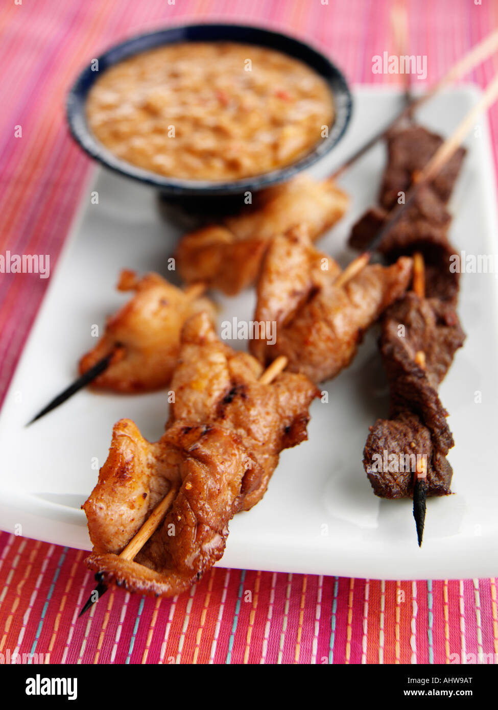Thai Sate beef chicken and pork on wooden skewers editorial food Stock ...