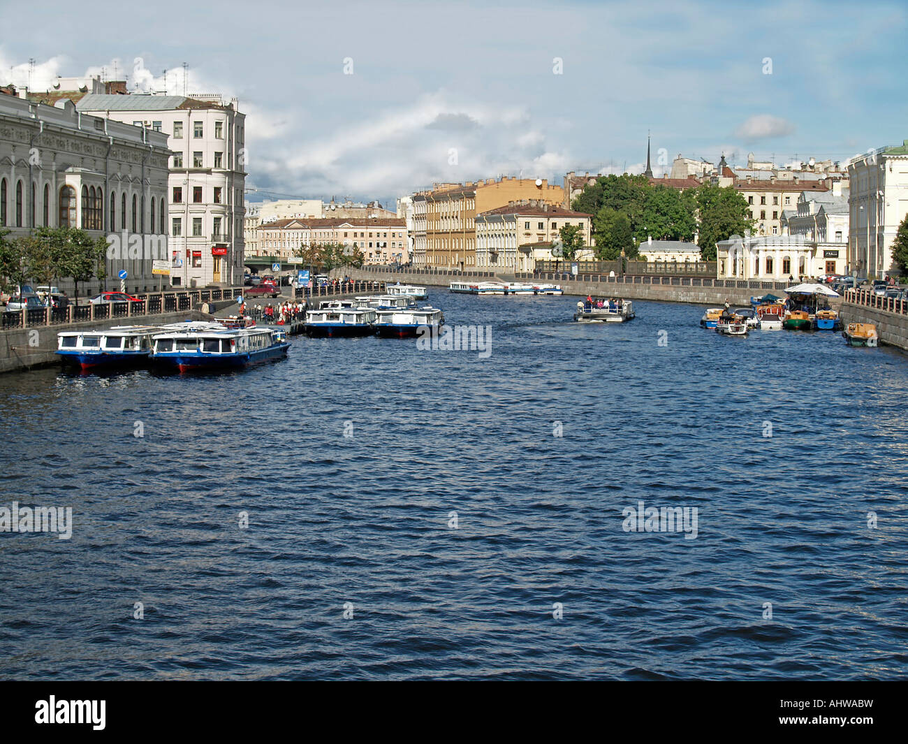 sightseeing boats and bridge over the river Fontanka in Saint ...