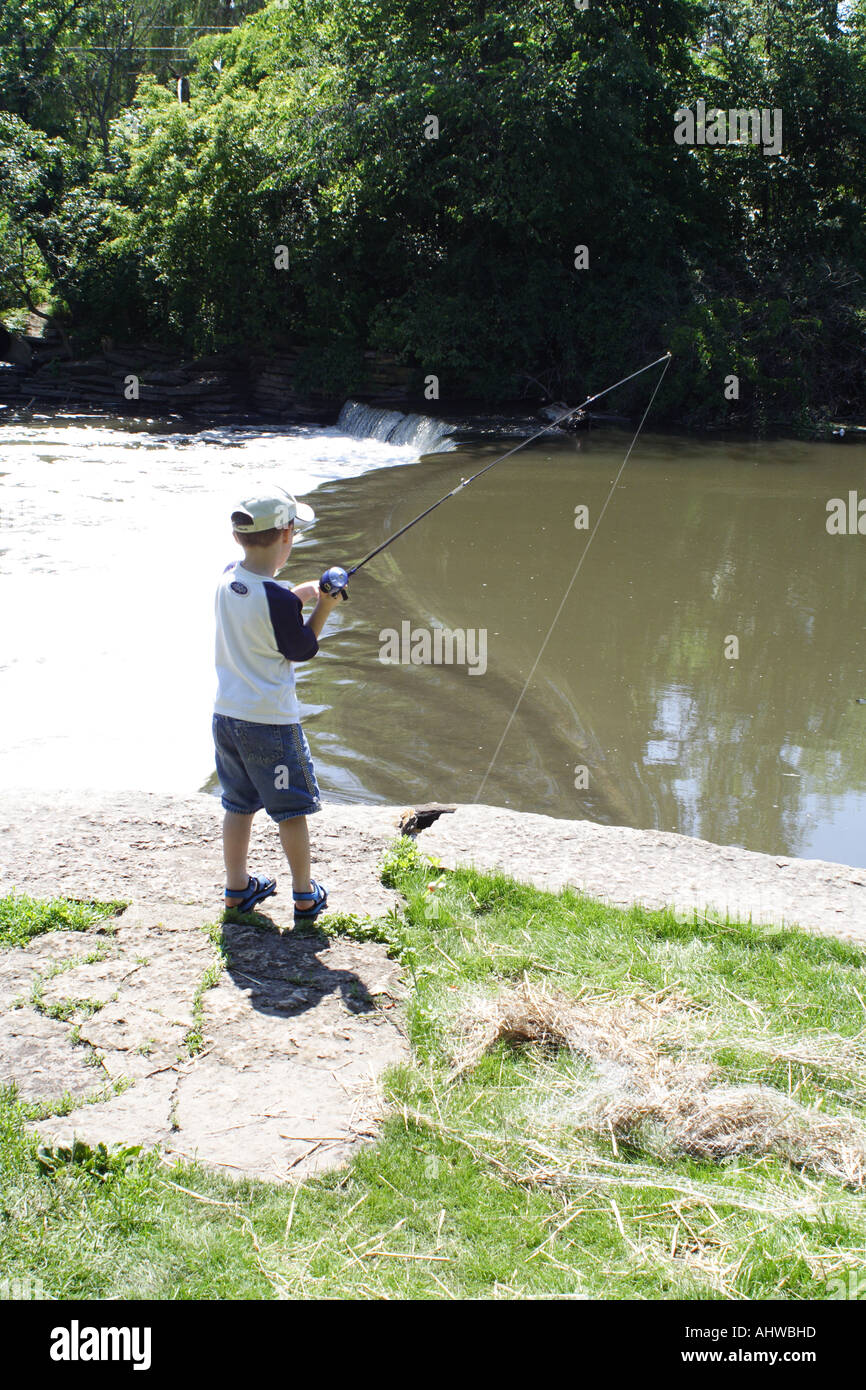 Fisher-boy on the river Stock Photo - Alamy
