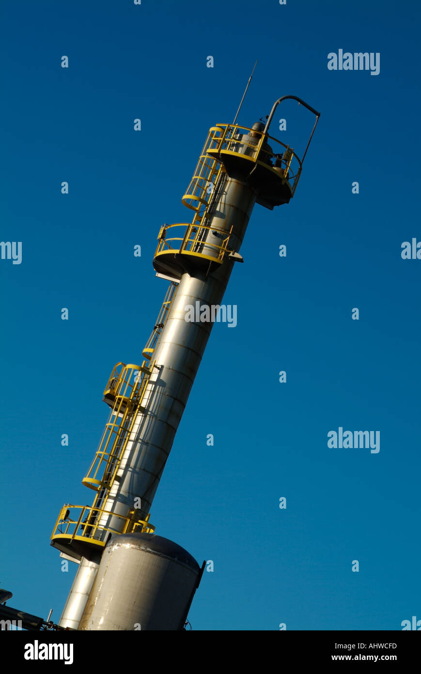 Chemical works distillation tower Stock Photo - Alamy