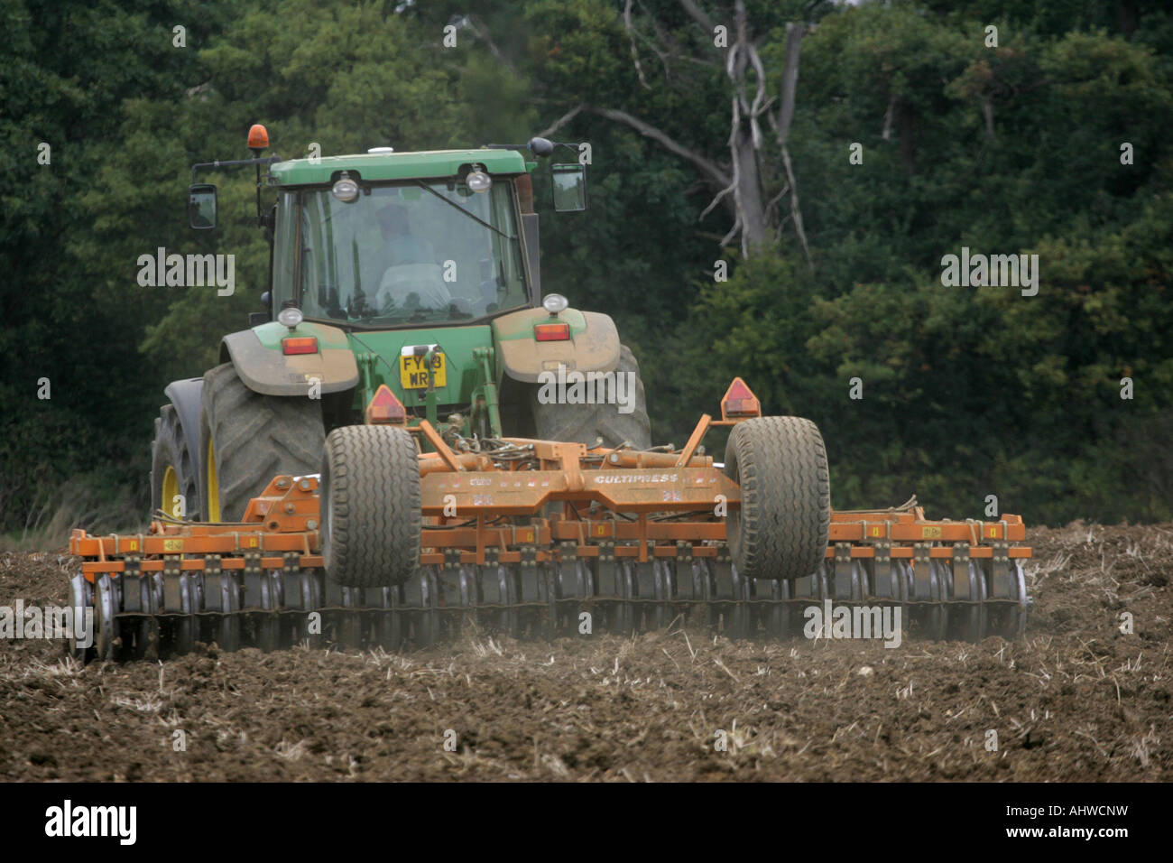 John Deere Tractor With Discs Stock Photo - Alamy