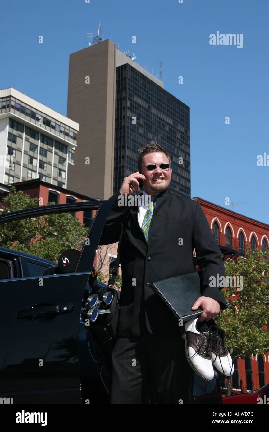 A young business man on the city street in USA US businessman out of ...
