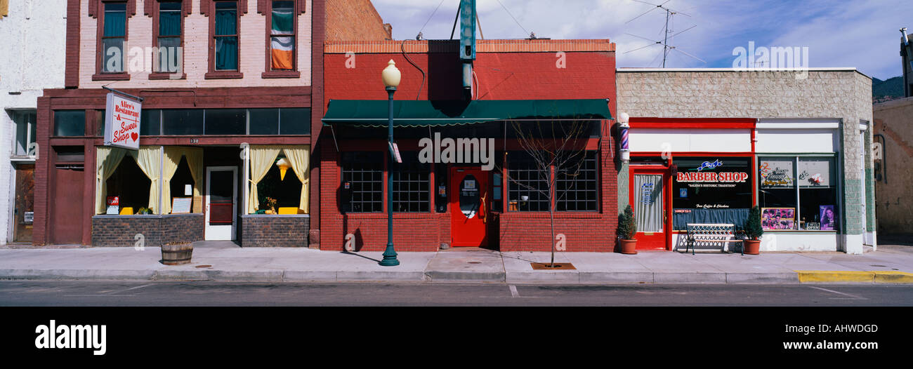 These are storefronts on a typical Main Street in a small town There is ...