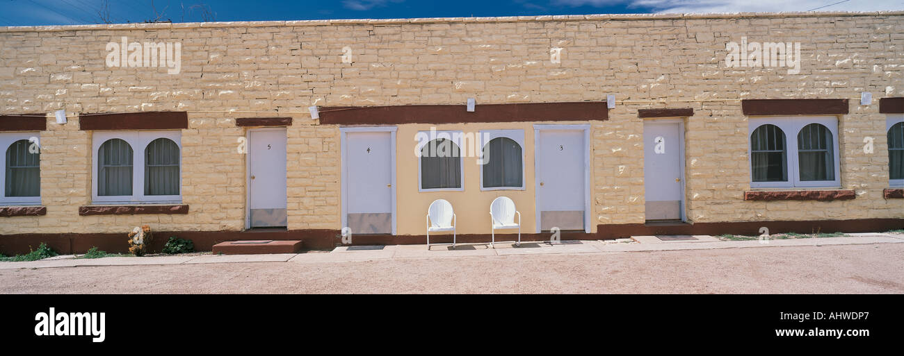 This is a yellow brick motel on Route 66 it sits next to the road There ...