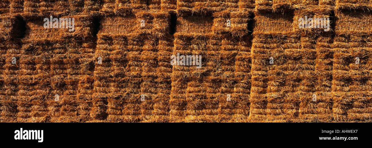 This is a stack of rectangular hay stacks fitted together to form a ...