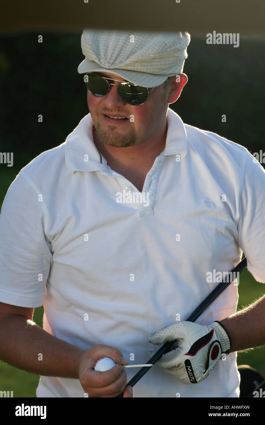 American golf player portrait of a caucasian young man Summer outdoor ...