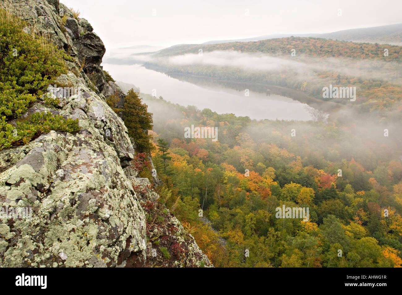 Foggy fall color morning at the Lake of the Clouds overlook in ...