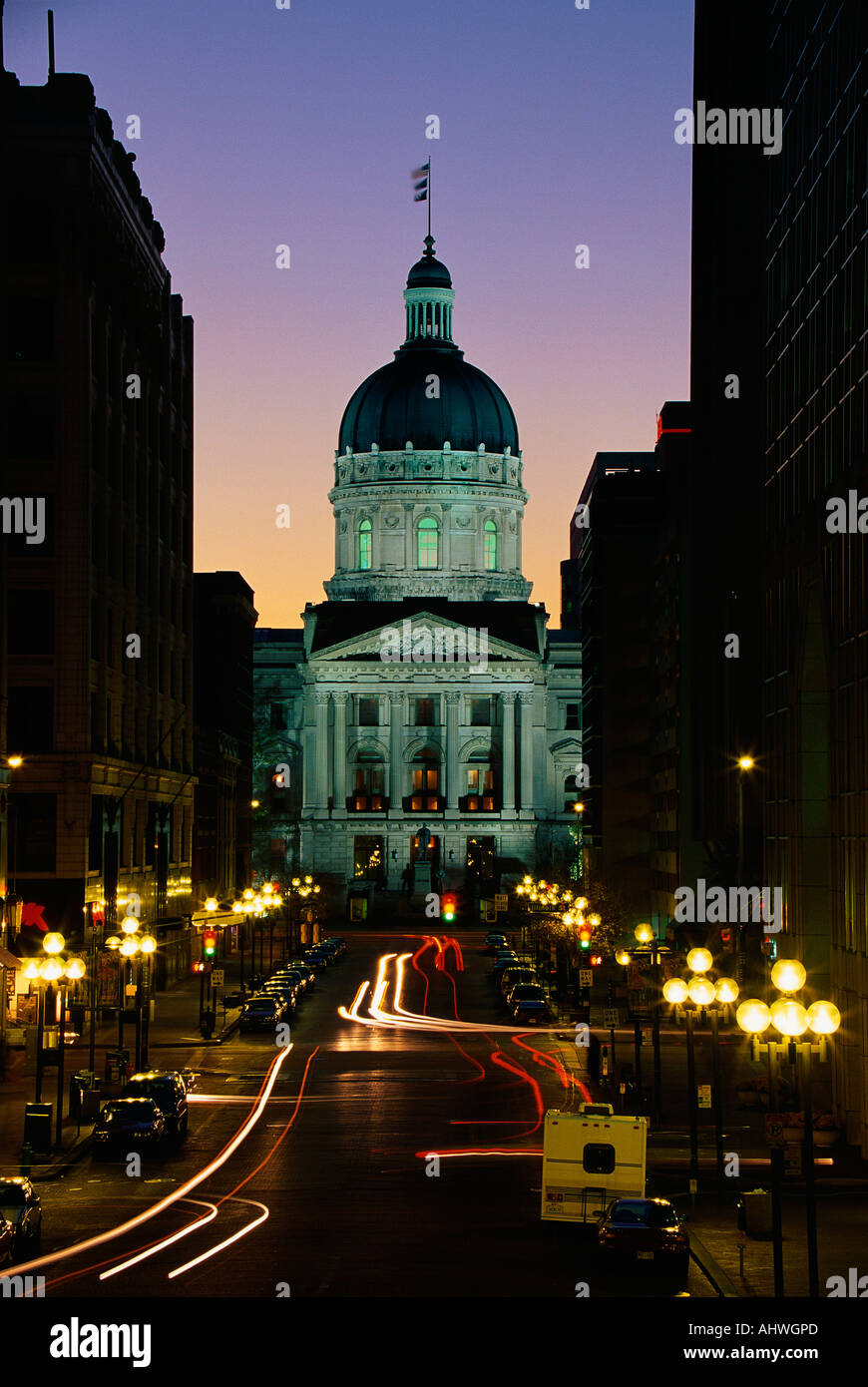 This is the State Capitol building at sunset There is a road with ...