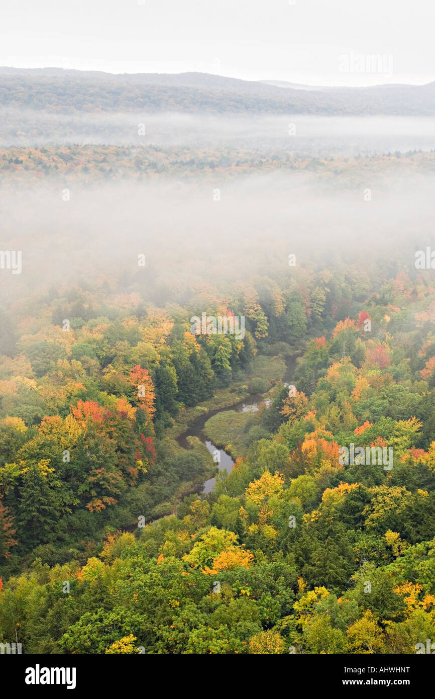 Foggy fall color morning at the Lake of the Clouds overlook in ...