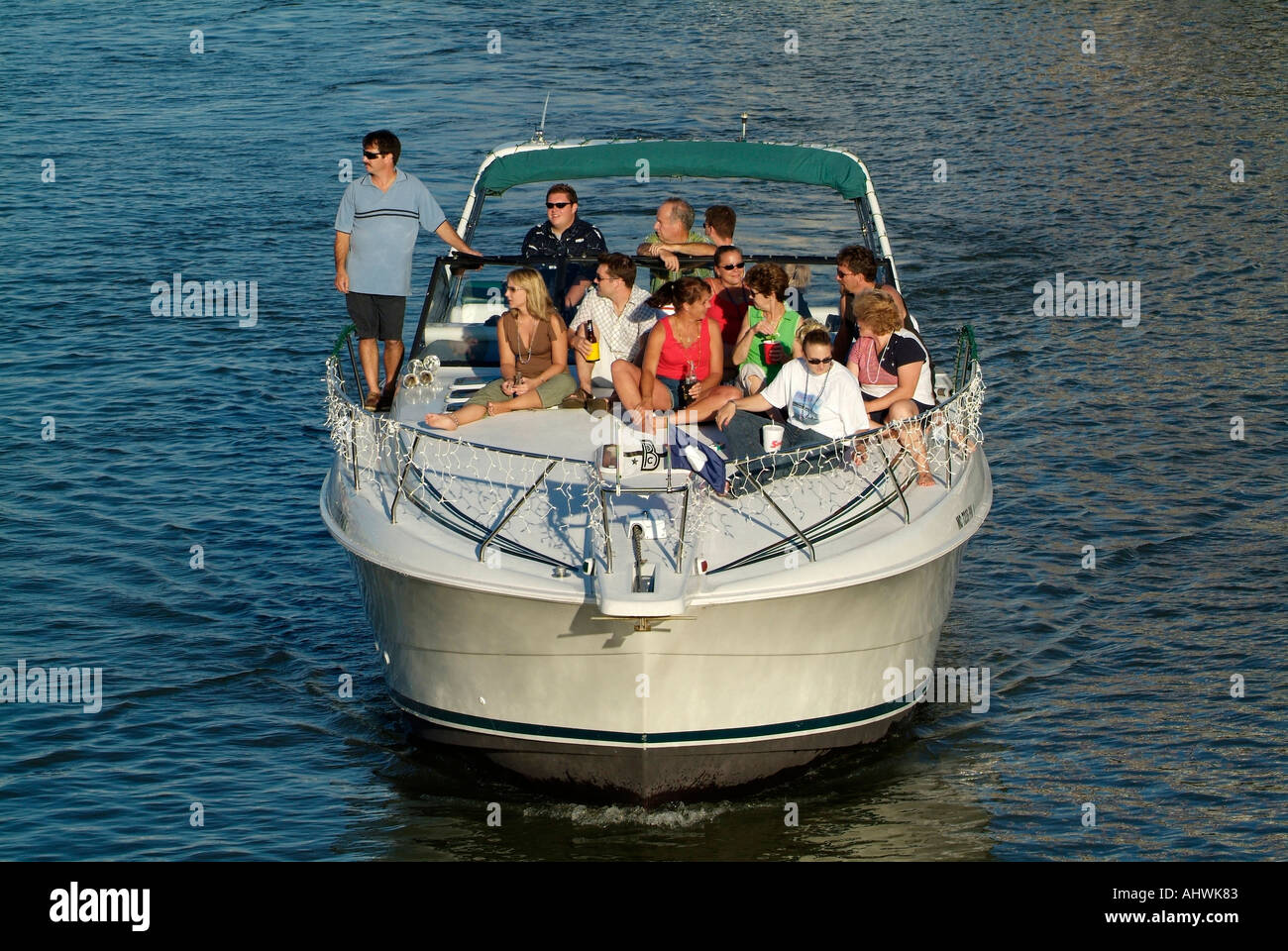Families enjoy boating in pleasure craft on the Black River in Port ...