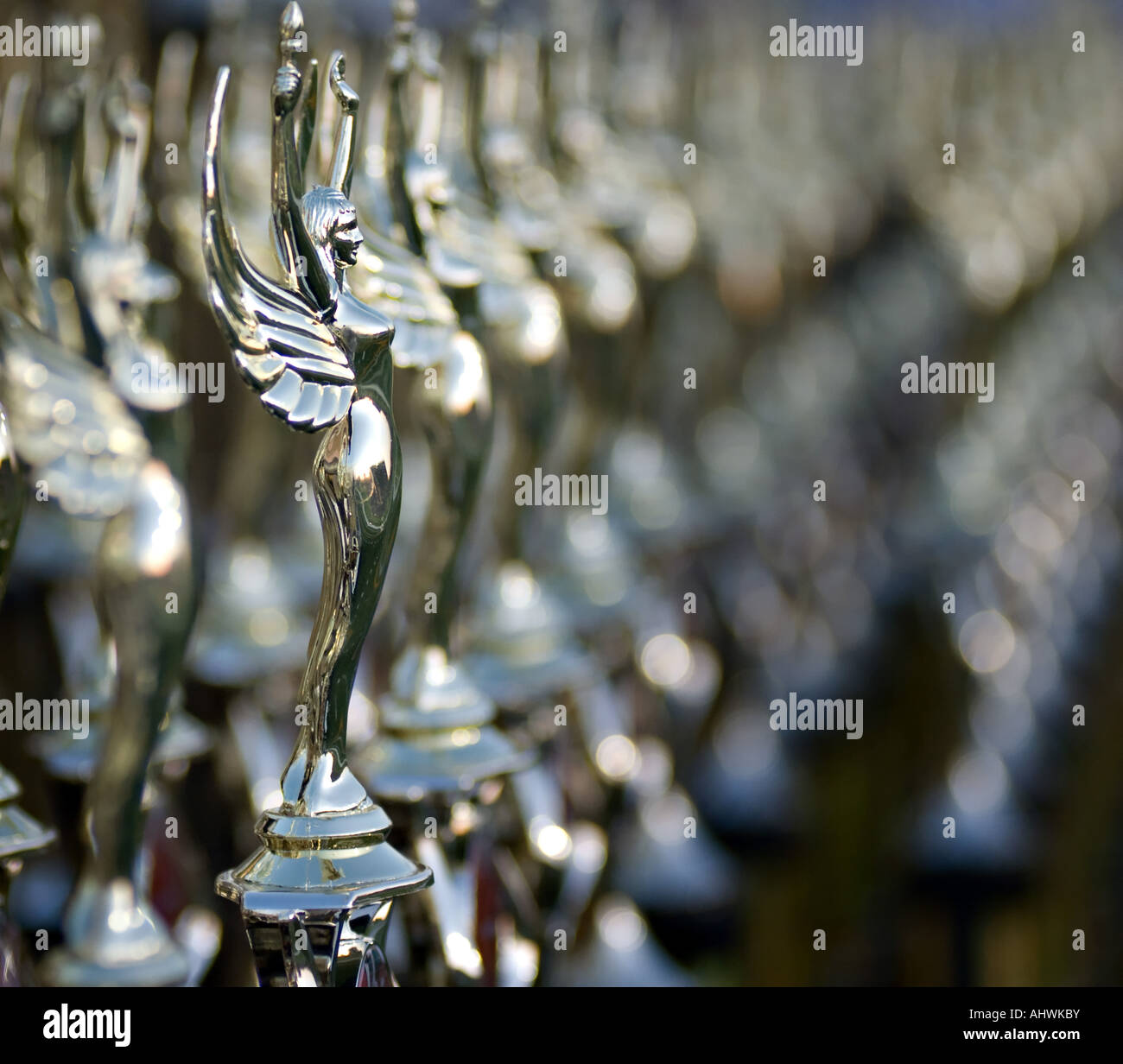 Trophies lined up for award Stock Photo - Alamy