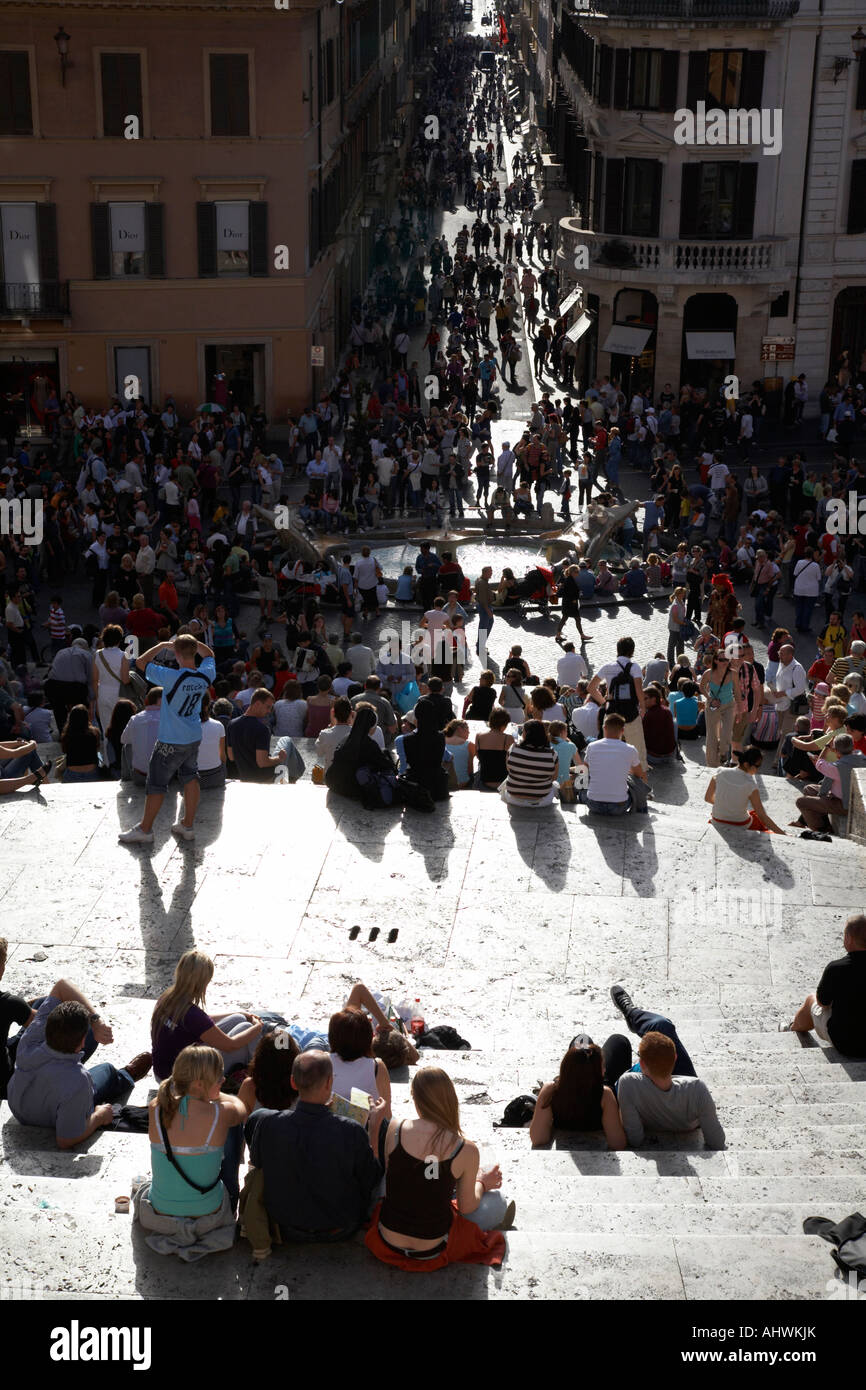 looking down over crowd of tourists and locals on the spanish steps ...