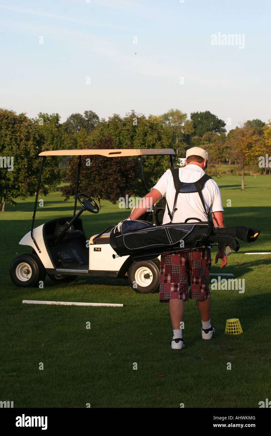 American golf courses golfer golf cart sport in USA Stock Photo - Alamy