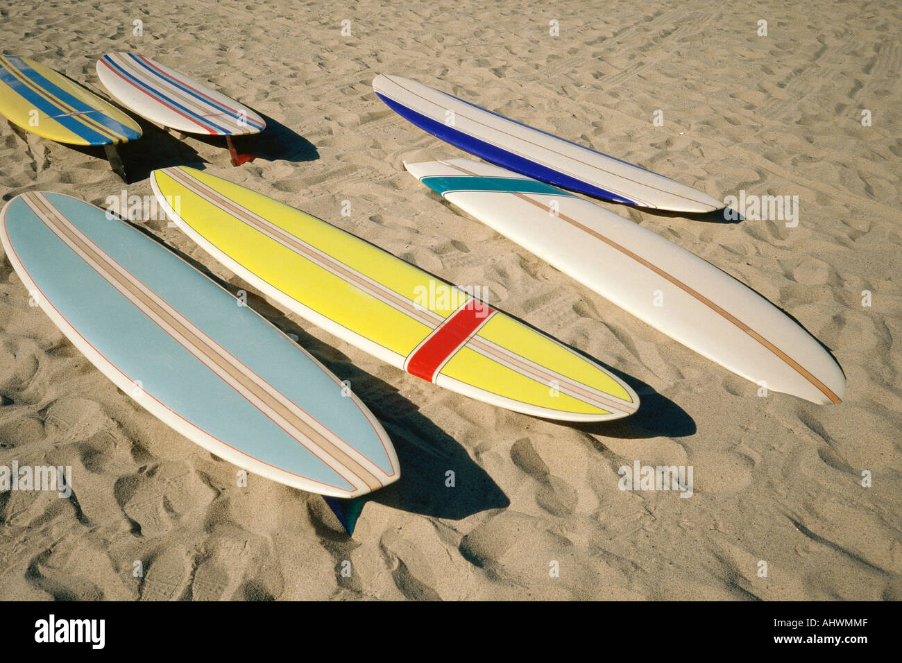 Surfboards lying on sand Stock Photo - Alamy
